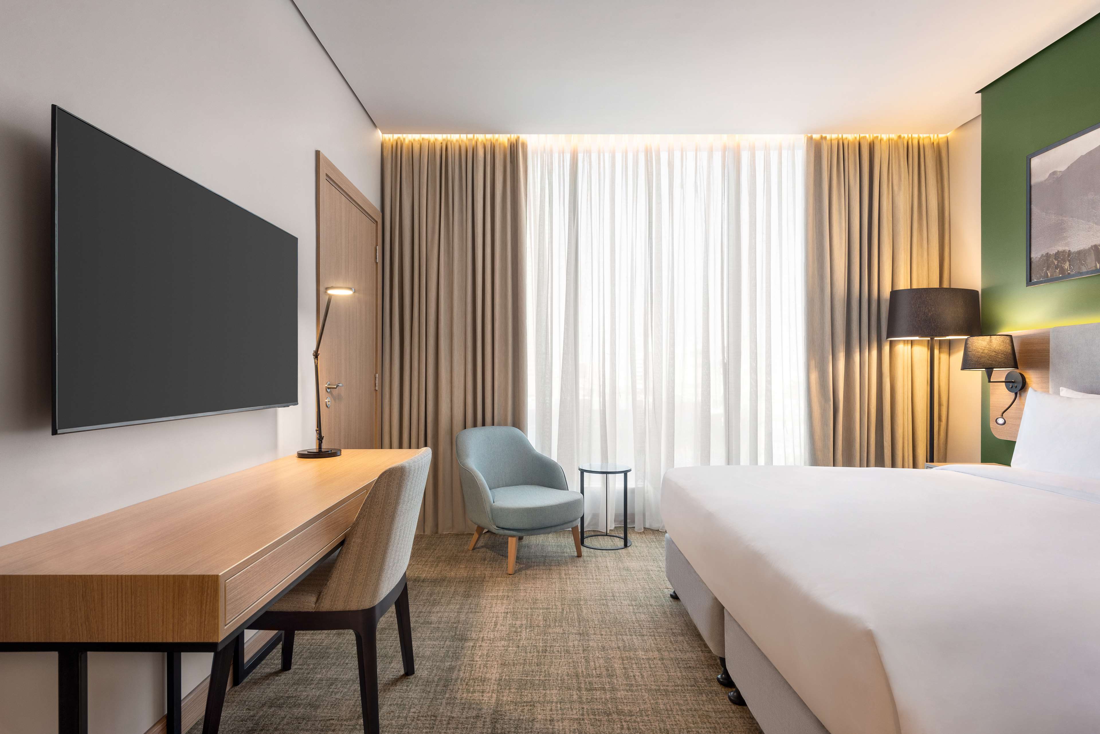 Wake up to views of Al Yasmin District in Riyadh | Radisson Hotels