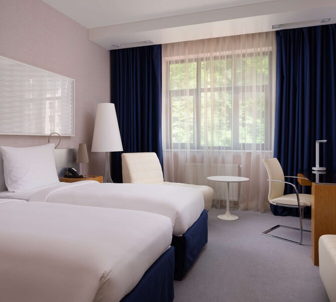 Номера и люксы — Radisson, Rosa Khutor Ski Resort
